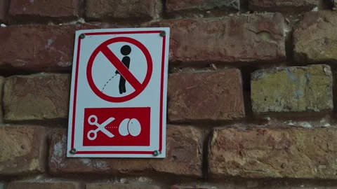 A warning sign indicating prohibited act... | Stock Video | Pond5