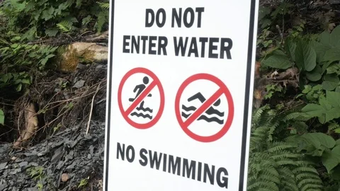 Warning Sign Reads - Do Not Enter Water ... | Stock Video | Pond5
