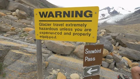 A warning sign while hiking on the Berg ... | Stock Video | Pond5