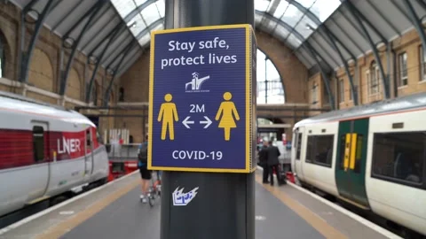 Warning signs telling people to stay 2 ... | Stock Video | Pond5