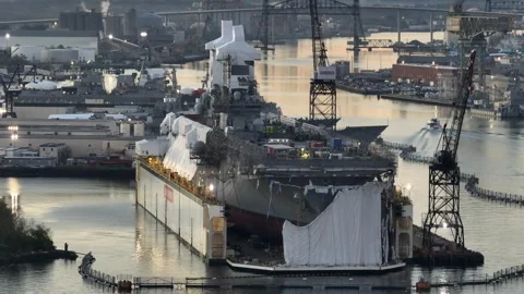 Warship in dry dock at a naval shipyard ... | Stock Video | Pond5