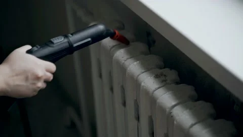Washing the heating radiator screen with... | Stock Video | Pond5