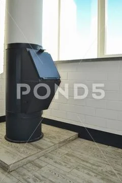 Waste disposal container in the multi-storey building. Stock Photo ...