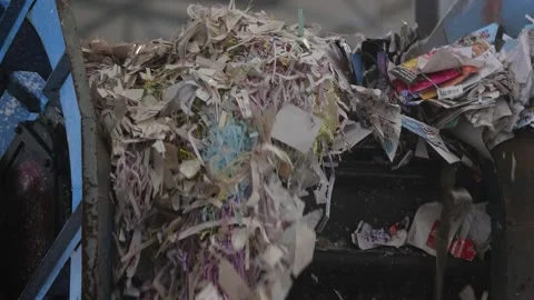 the waste paper recycling process starte... | Stock Video | Pond5