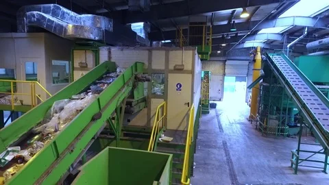 Waste segregation hall, trash on the tap... | Stock Video | Pond5