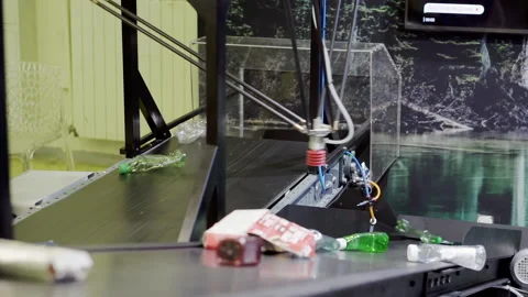 Waste sorting with a mechanical manipula... | Stock Video | Pond5