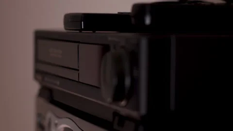 Watching movie at home VHS tape. VCR ana... | Stock Video | Pond5