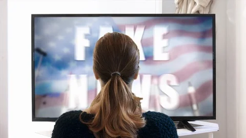 Watching Television Fake News TV Zoom In | Stock Video | Pond5