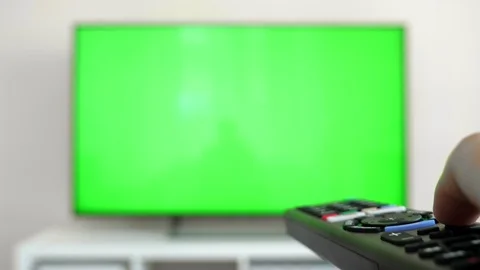 Watching tv with green screen at home in... | Stock Video | Pond5