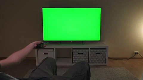 Watching tv with green screen at home in... | Stock Video | Pond5