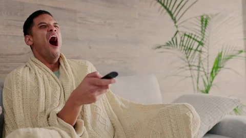 Watching tv, sick fatigue and tired man ... | Stock Video | Pond5