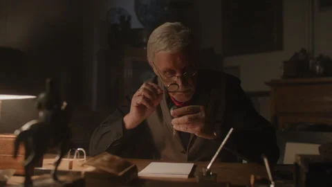 Watchmaker checking pocket watch using t... | Stock Video | Pond5