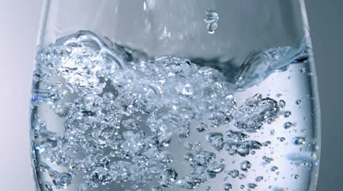 Water being poured into glass, Slow Moti... | Stock Video | Pond5