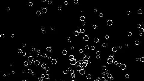 Water bubbles rising up on the black bac... | Stock Video | Pond5