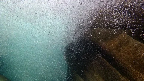 Water churned boils and bubbles underwat... | Stock Video | Pond5