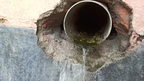 water coming out from a water drainage P... | Stock Video | Pond5