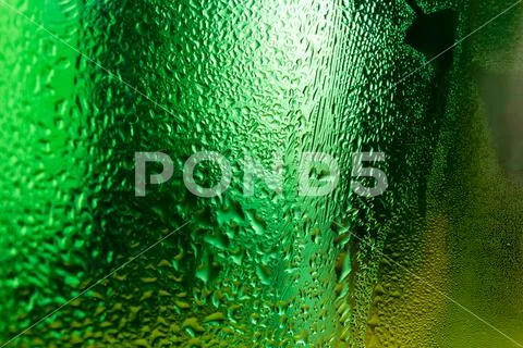 Water condensed on green glass surface background. Stock Image #206045836