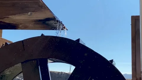 Water dripping from wooden trough on mov... | Stock Video | Pond5