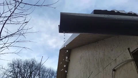 water drips from the roof through the ol... | Stock Video | Pond5