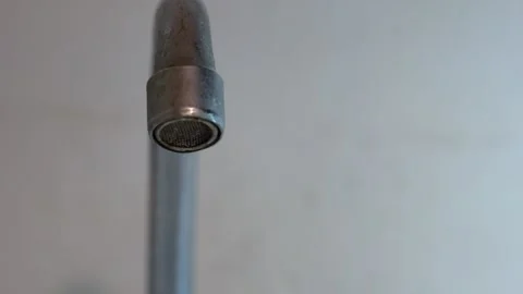Water drop falling down from old rusty t... | Stock Video | Pond5
