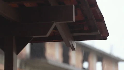Water drop, Rain falling from the roof, ... | Stock Video | Pond5