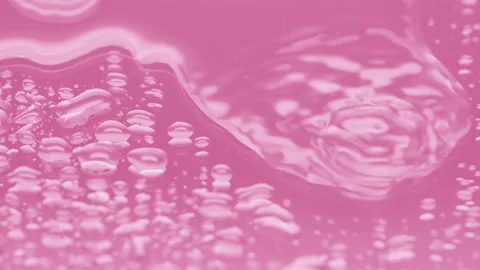 Water drops fall down on big one splashi... | Stock Video | Pond5