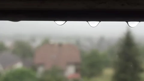 Water drops falling slowly down during r... | Stock Video | Pond5