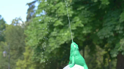 Water drops in frog fountain in 4k slow ... | Stock Video | Pond5