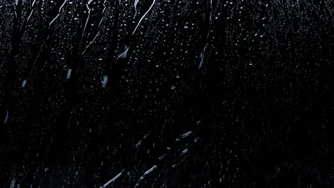 Water drops on the glass in Alpha Square | Stock Video | Pond5