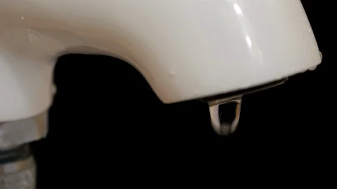 Water Drops From The Modern White Tap In... | Stock Video | Pond5