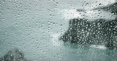Water drops on transparent window pane d... | Stock Video | Pond5