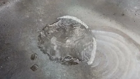 Water evaporates on hot metal. physical ... | Stock Video | Pond5