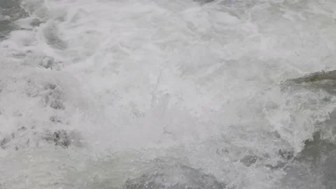 Water falls from man made cascade closeu... | Stock Video | Pond5