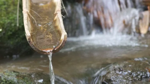 water flow from the bamboo tube | Stock Video | Pond5