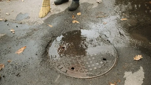 Rain Manhole Cover Cover Stock Footage ~ Royalty Free Stock Videos | Pond5