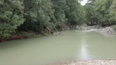 Water Flowing In Mild Current At The Cur... | Stock Video | Pond5