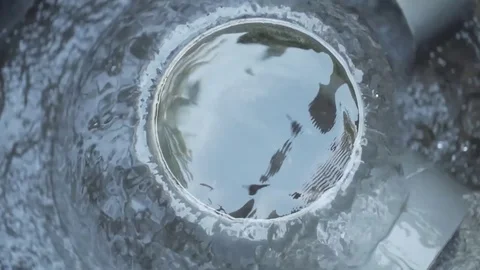 water flowing out of a PVC pipe | Stock Video | Pond5