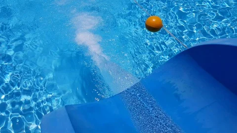 water flows into the pool with a slide | Stock Video | Pond5
