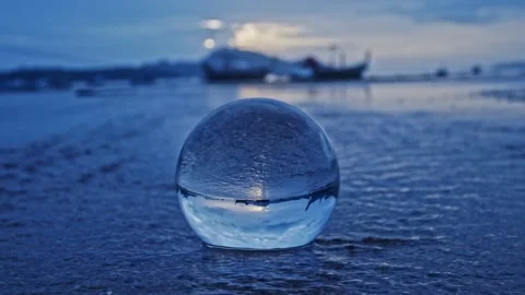 Water flows through the crystal ball in ... | Stock Video | Pond5