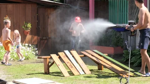 water fun for children in hot weather | Stock Video | Pond5