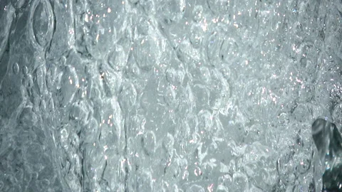 Water jet splashing. Closeup of water fo... | Stock Video | Pond5