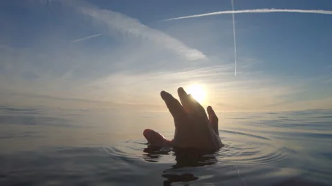 Water Level Footage of a Hand Reaching u... | Stock Video | Pond5