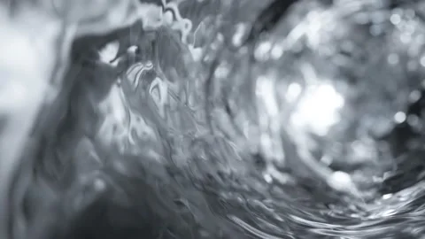 Water moves in a glass in slow motion. A... | Stock Video | Pond5