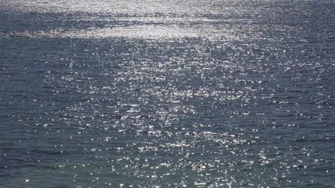 water ocean face with glowing shining su... | Stock Video | Pond5