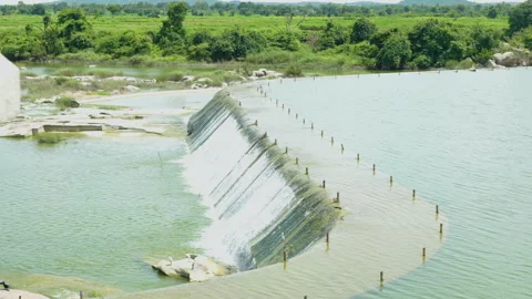 water overflow above the bridge at edupa... | Stock Video | Pond5