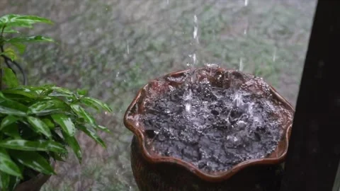Water overflow from ceramic container du... | Stock Video | Pond5