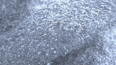 water passing underneath layer of ice as... | Stock Video | Pond5