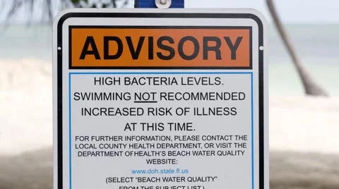 A water pollution warning sign advising ... | Stock Video | Pond5