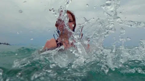 Water POV of Girl Splashing Sea Water | Stock Video | Pond5