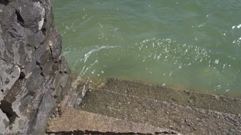 Water Ripple Splashing on Concrete Stair... | Stock Video | Pond5